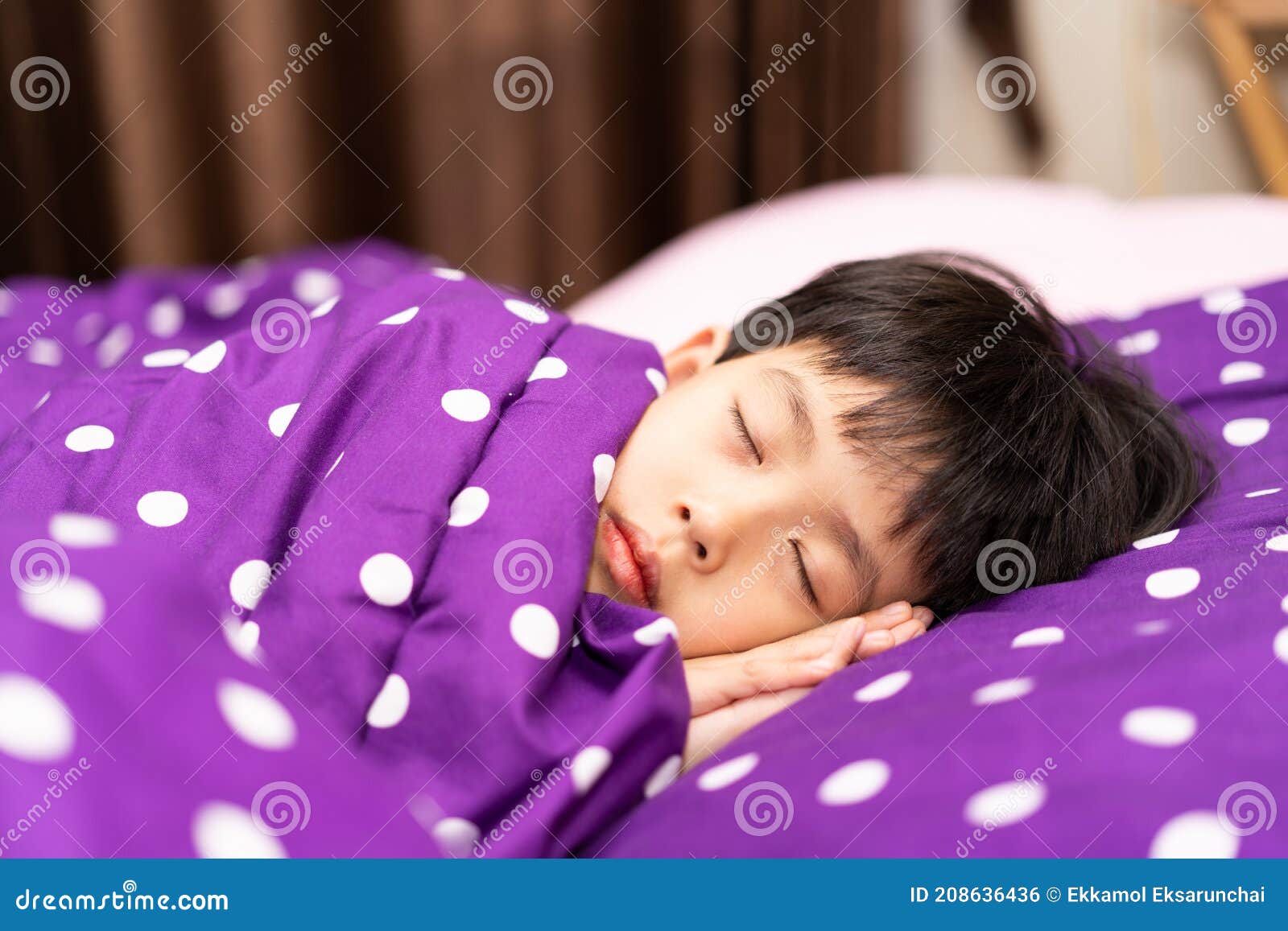 A Boy is Sleeping on the Bed Stock Photo - Image of insomnia, blanket ...