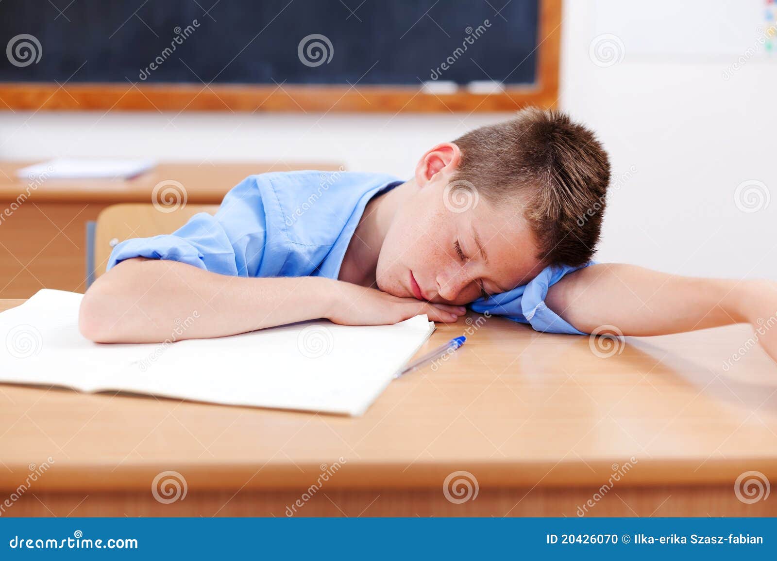 Boy sleeping in classroom stock photo. Image of learner - 20426070
