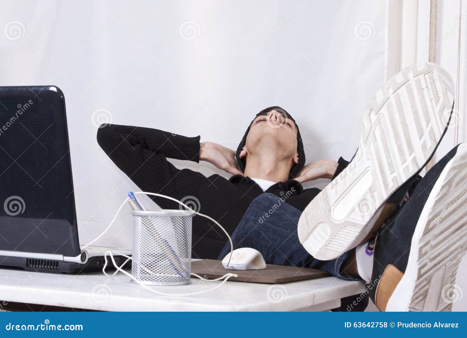 Boy sleeping with computer stock photo. Image of lying - 63642758