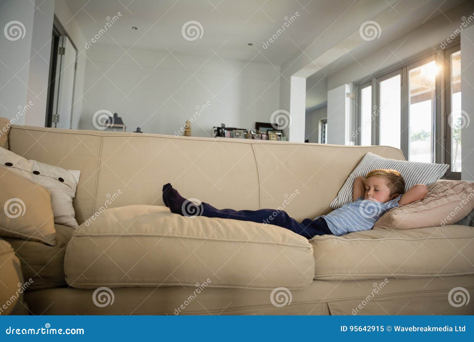 Boy Sleeping on Sofa in the Living Room Stock Image - Image of child ...