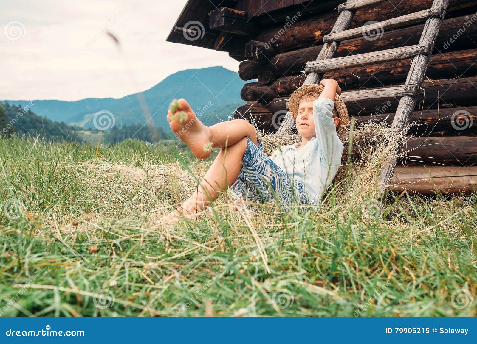 Boy Sleeps in Hay Under the Old Barn Stock Image - Image of heel ...