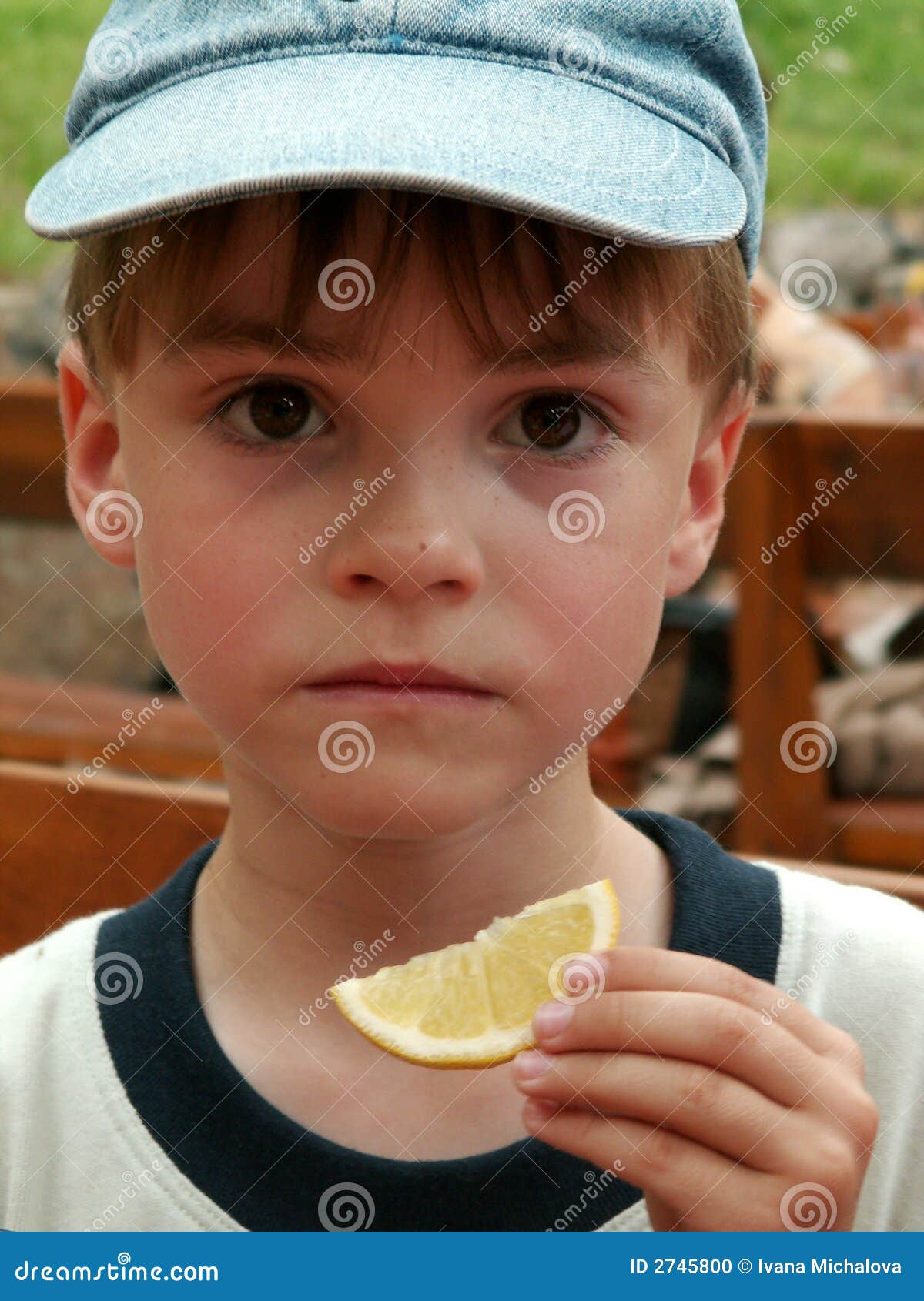 Boy and a slice of lemon stock photo. Image of youngster - 2745800