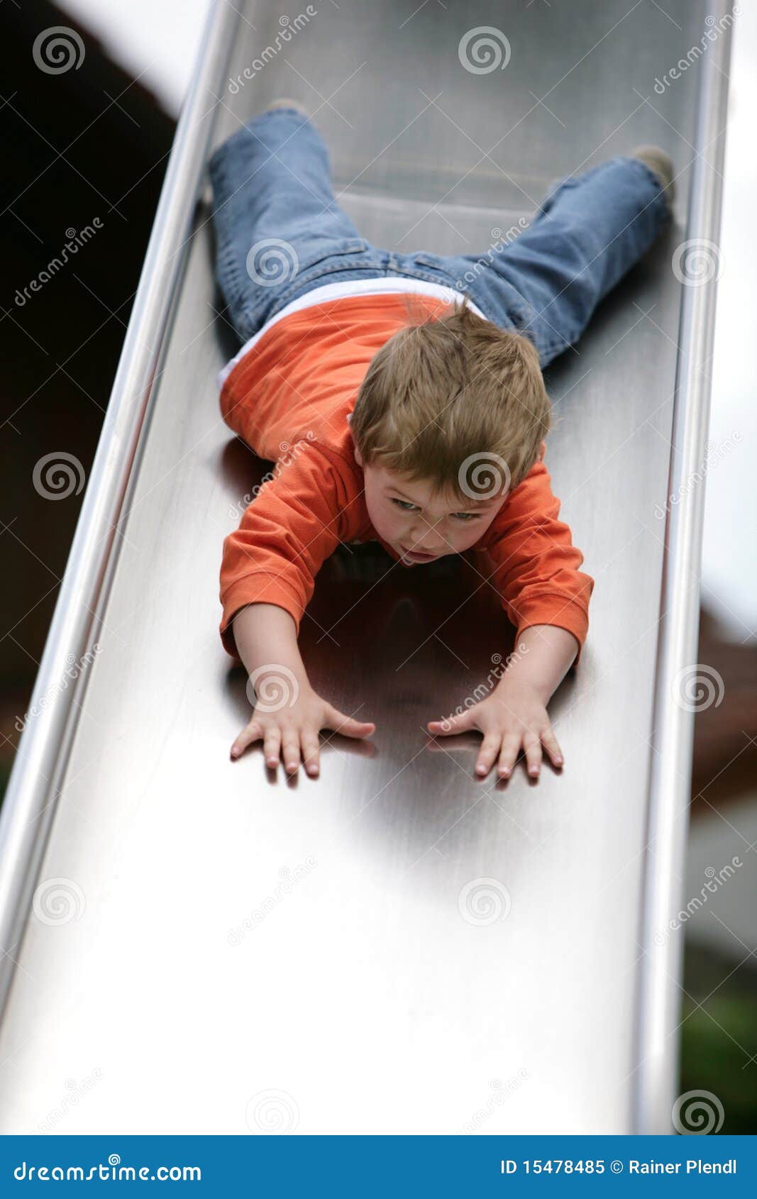 Boy on slide stock image. Image of cheerful, young, play - 15478485