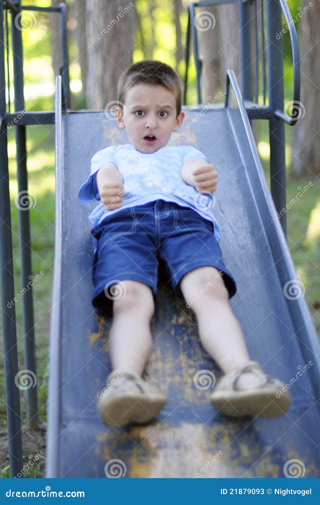 Boy on a slide stock image. Image of enjoy, childhood - 21879093