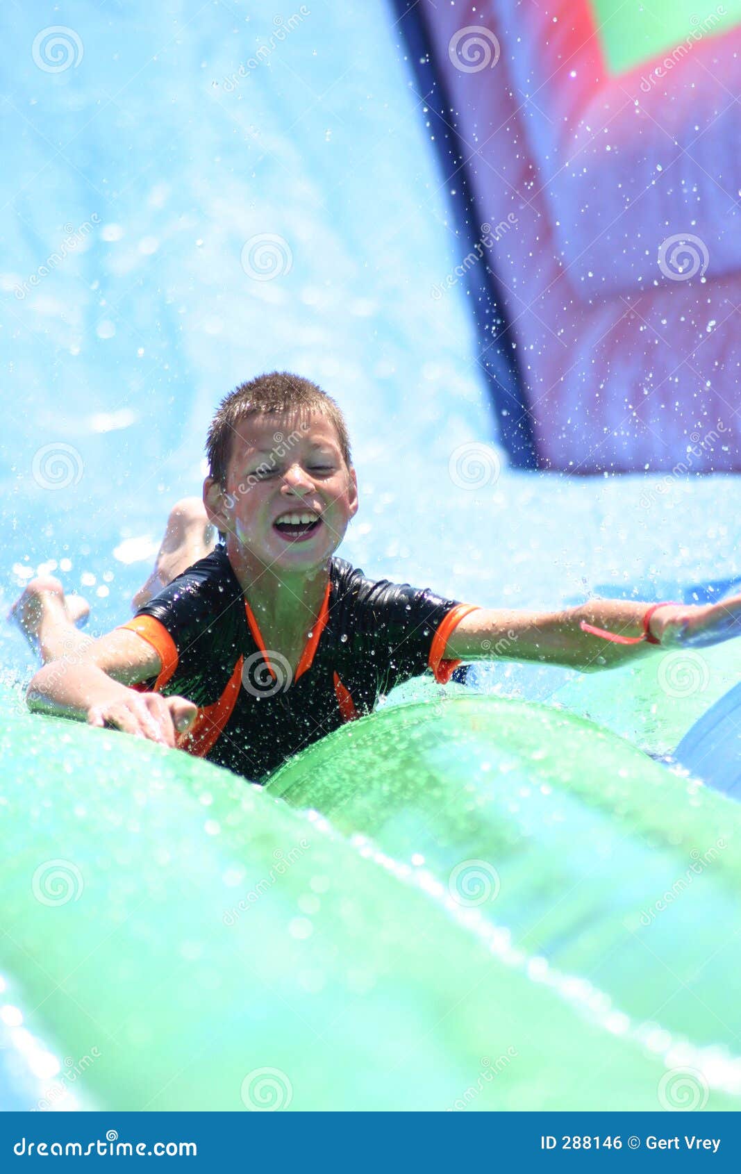 Boy on slide stock photo. Image of slip, costume, sport - 288146