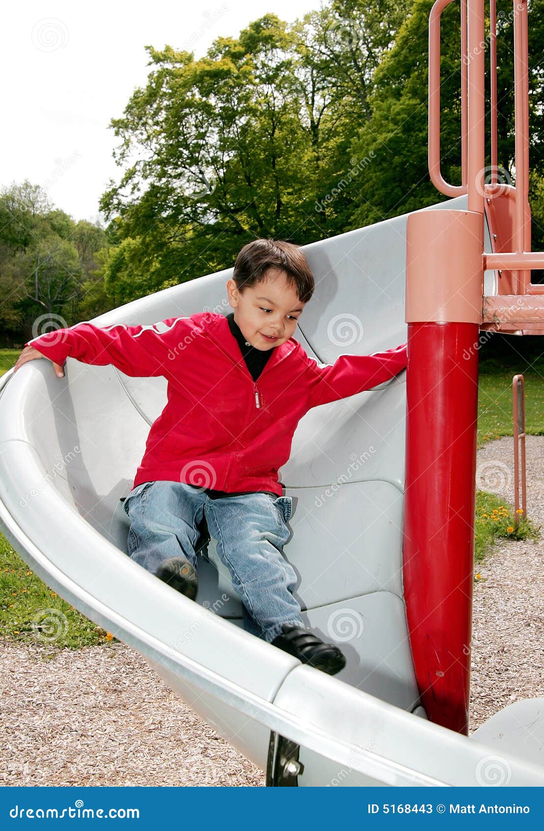 Boy on a slide stock image. Image of children, happy, playful - 5168443