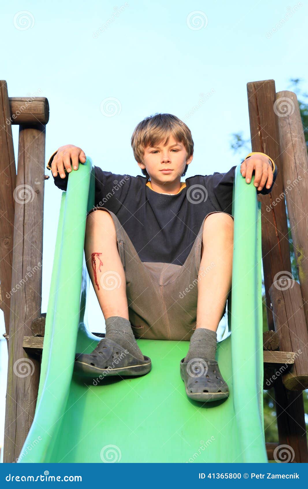 Boy on slide stock photo. Image of smiling, childhood - 41365800