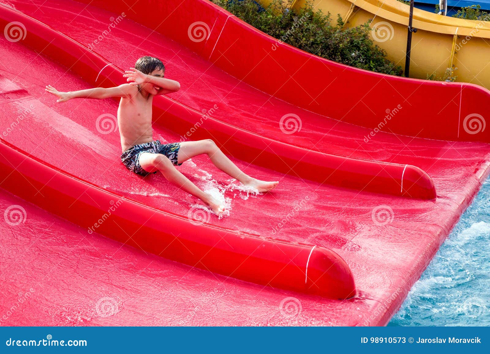 Boy Sliding on a Water Slide Stock Image - Image of young, aquapark ...