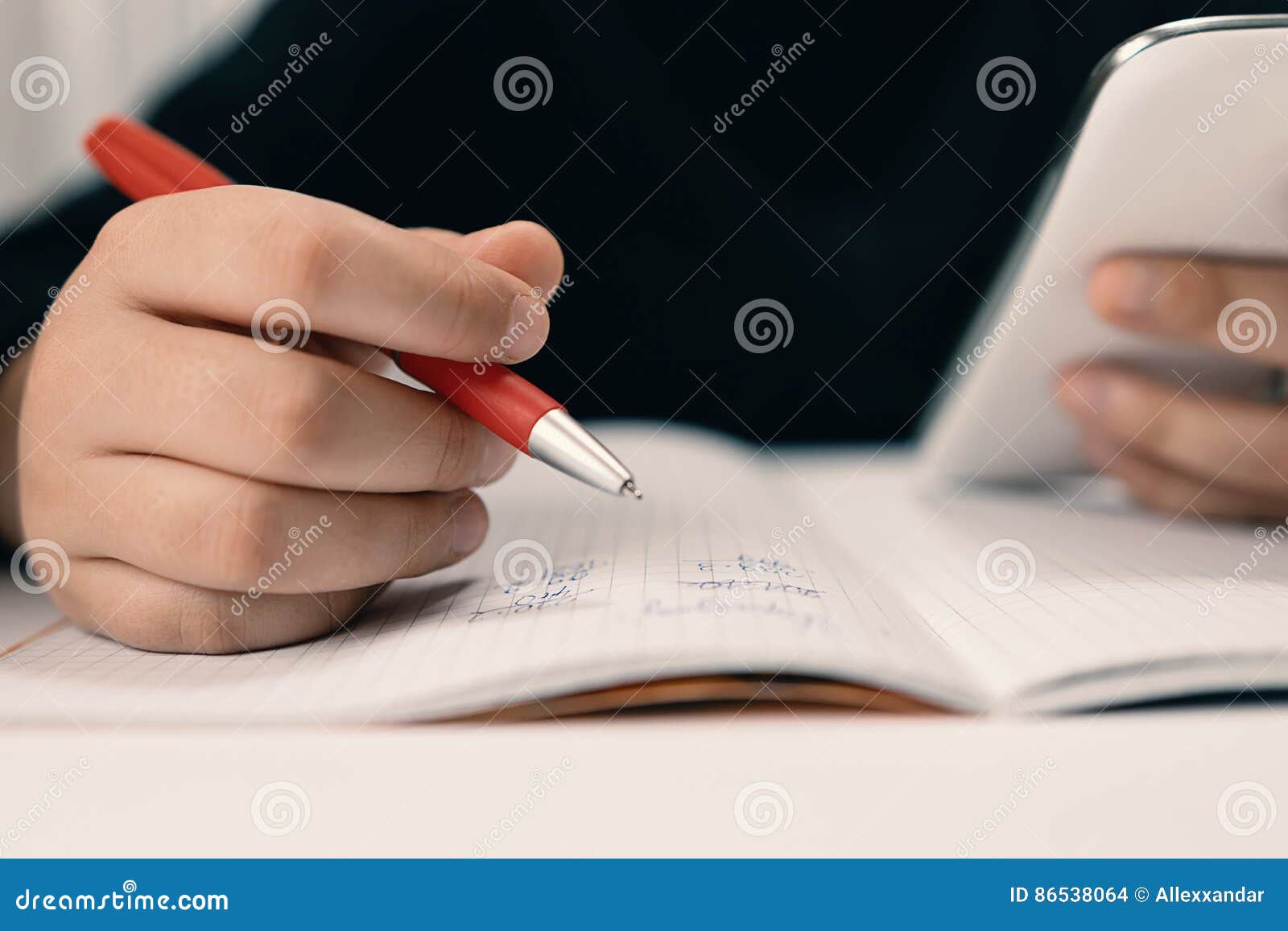 Boy with Smartphone Doing Homework. Learning Concept Stock Photo ...
