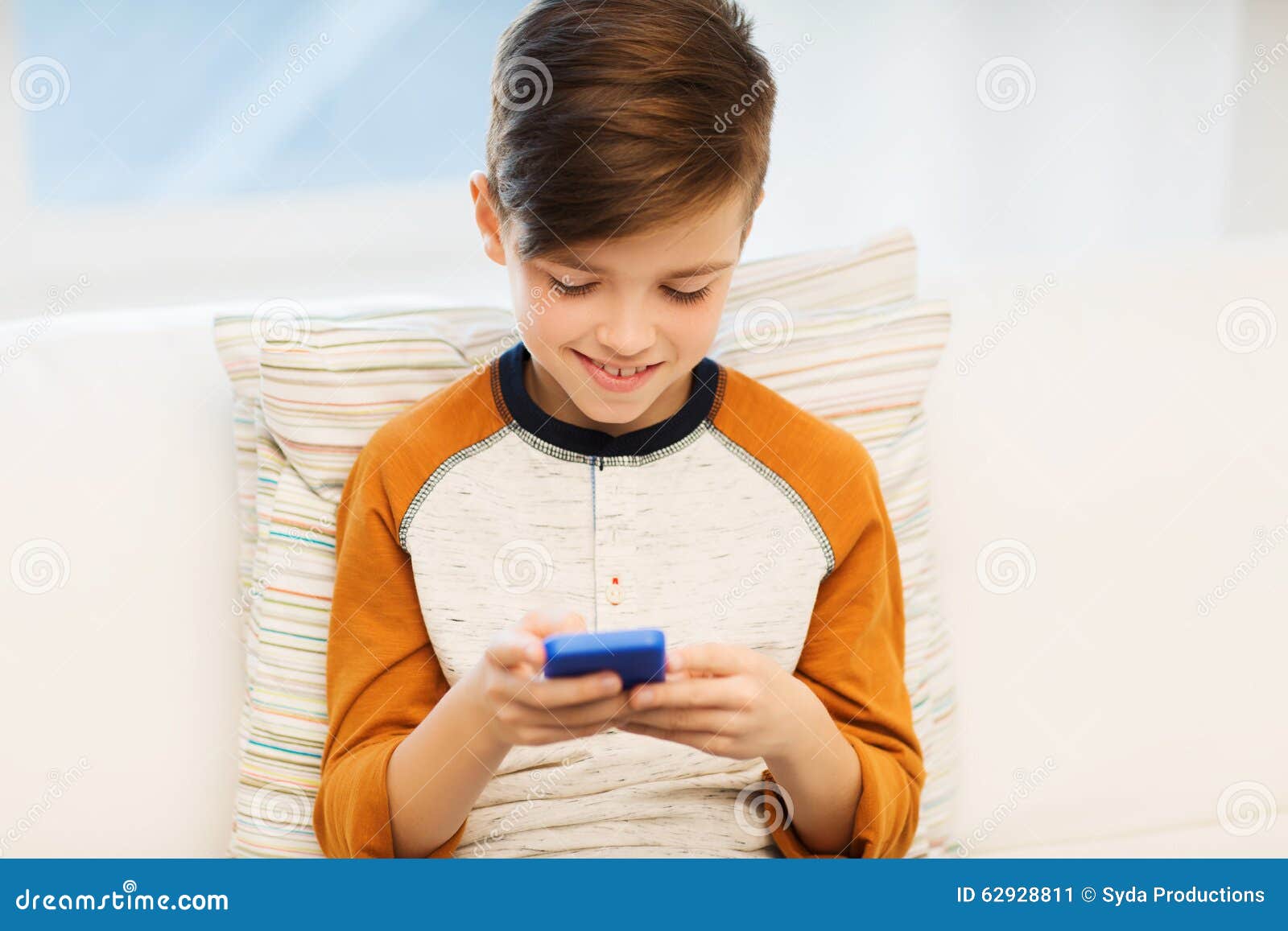 Boy with Smartphone Texting or Playing at Home Stock Image - Image of ...
