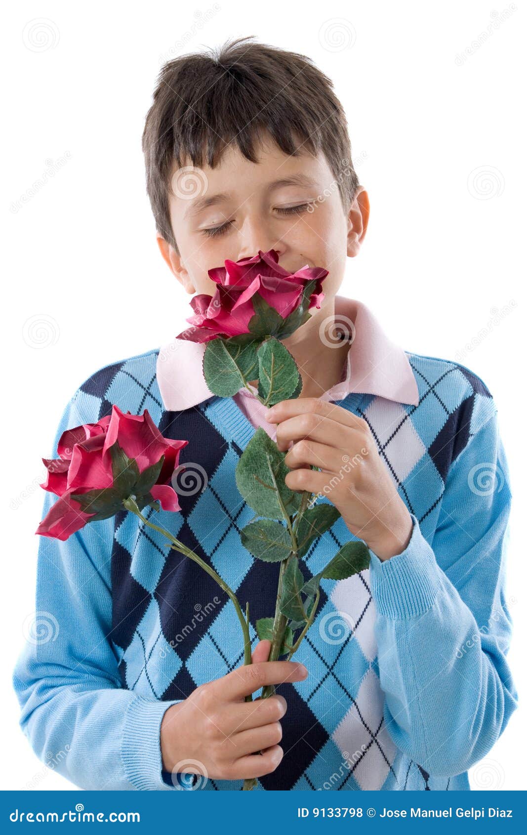 Boy smelling a flower stock photo. Image of enjoyable - 9133798