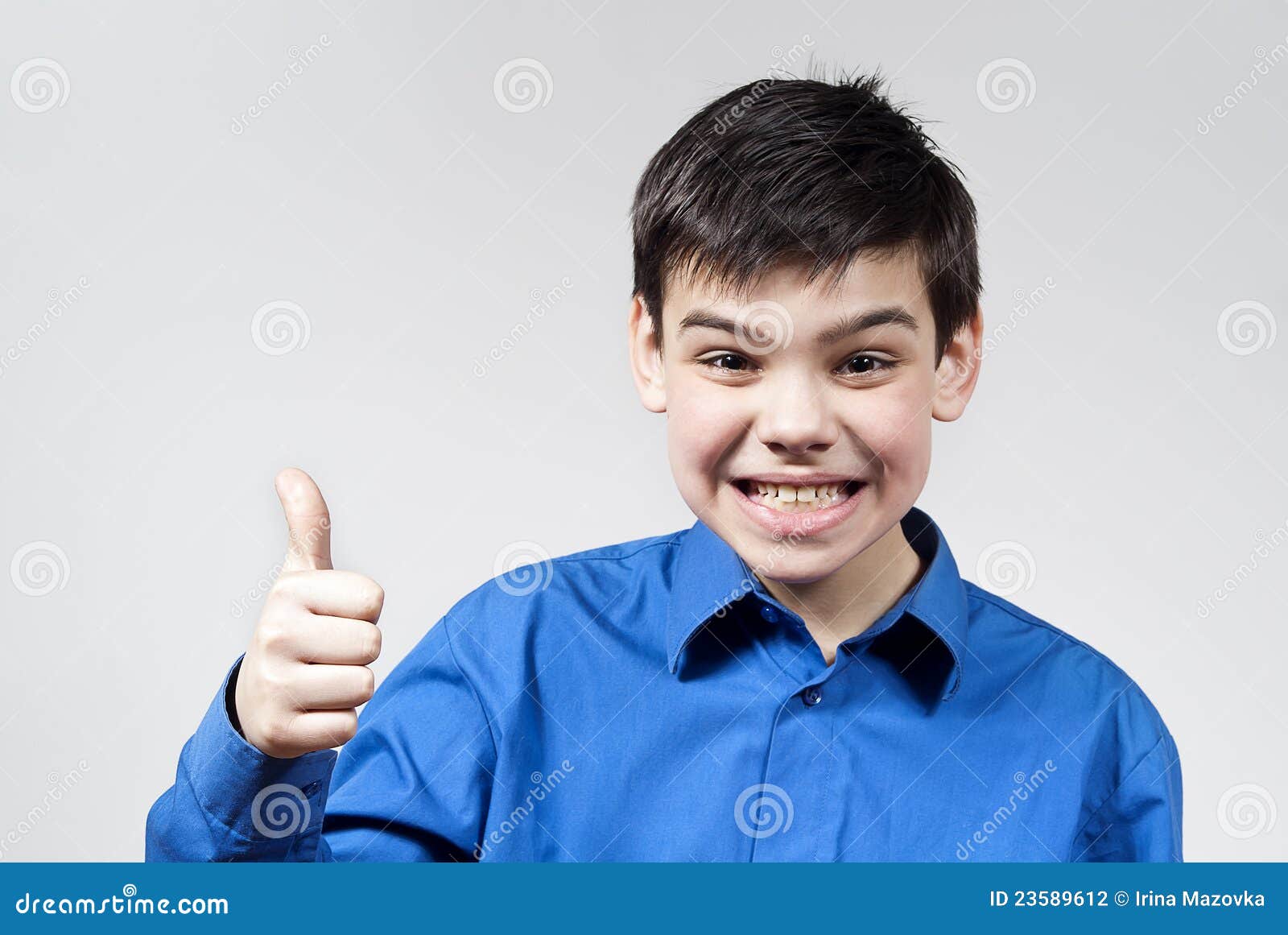 Boy Smiles and Shows the Finger Stock Photo - Image of education, male ...