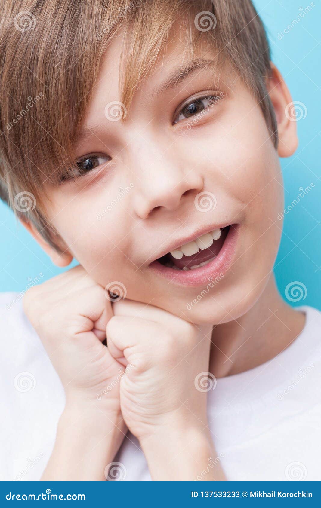 Boy smiles and is touched stock image. Image of concept - 137533233