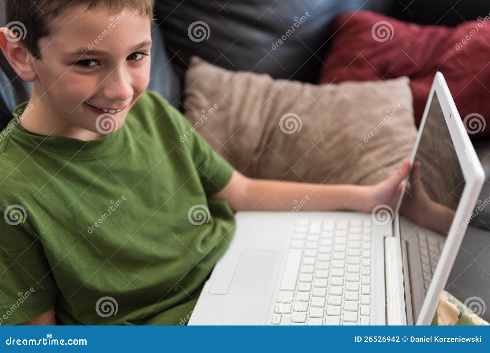 Boy smiling with computer stock photo. Image of little - 26526942