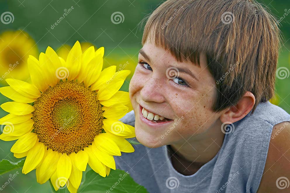 Boy Smiling with a Flower stock image. Image of funny - 3160325