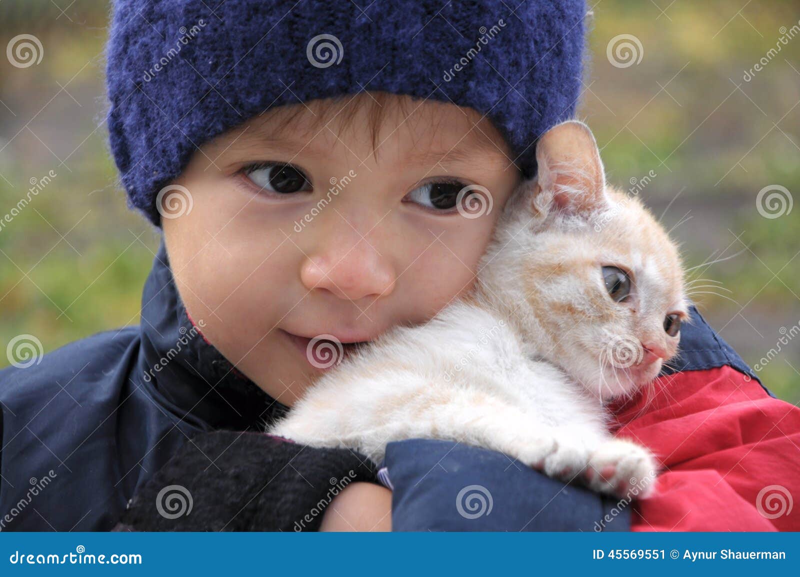Boy Smiling Hugging Cat Stock Image | CartoonDealer.com #45569551