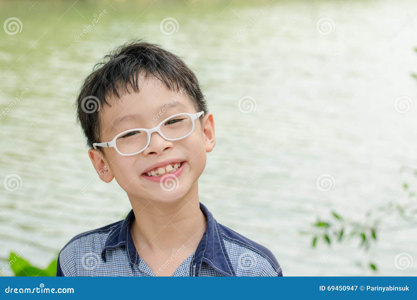 Boy smiling outdoor stock image. Image of childhood, paper - 69450947