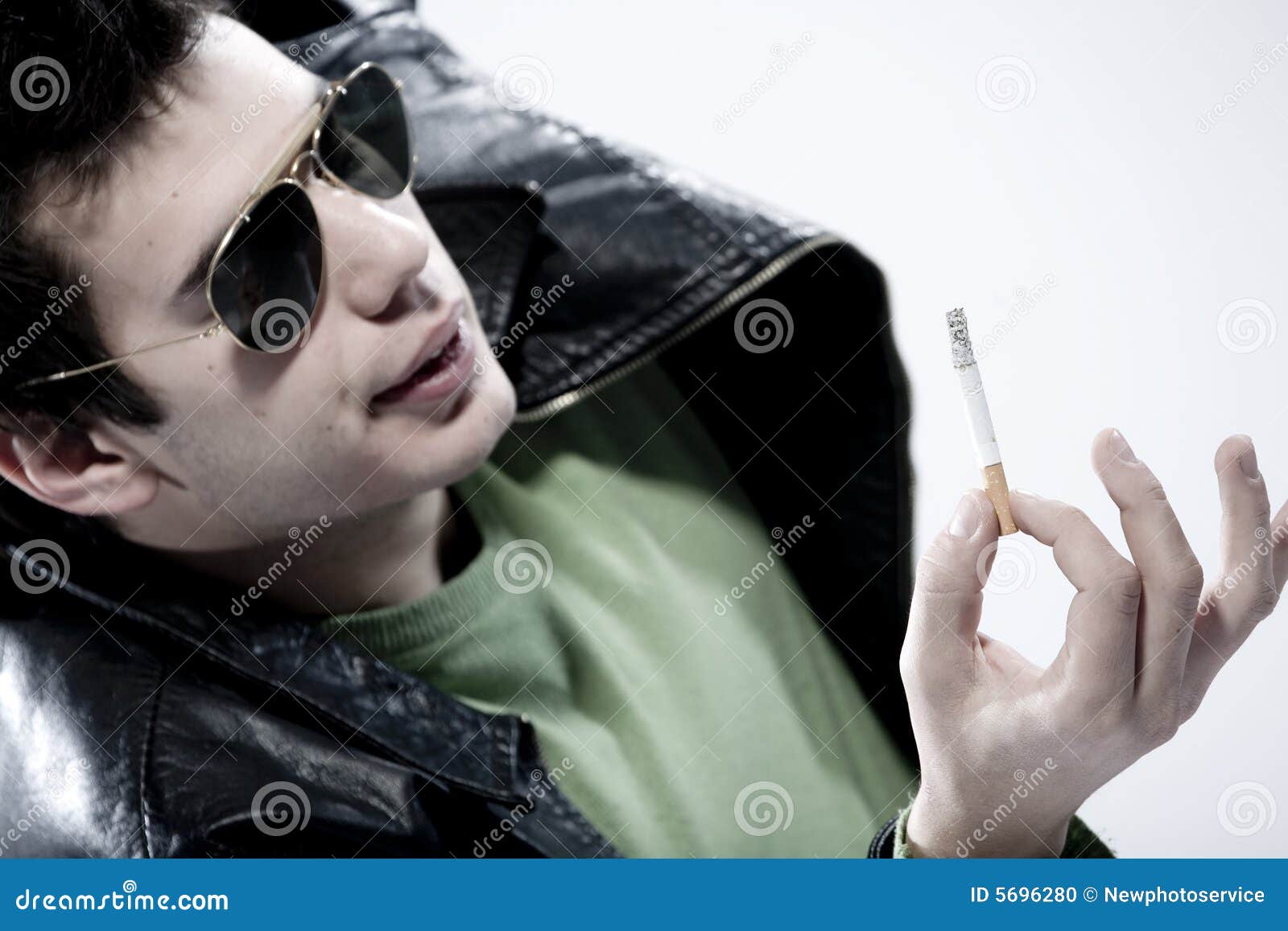 Boy smoking a cigarette stock photo. Image of lifestyles - 5696280
