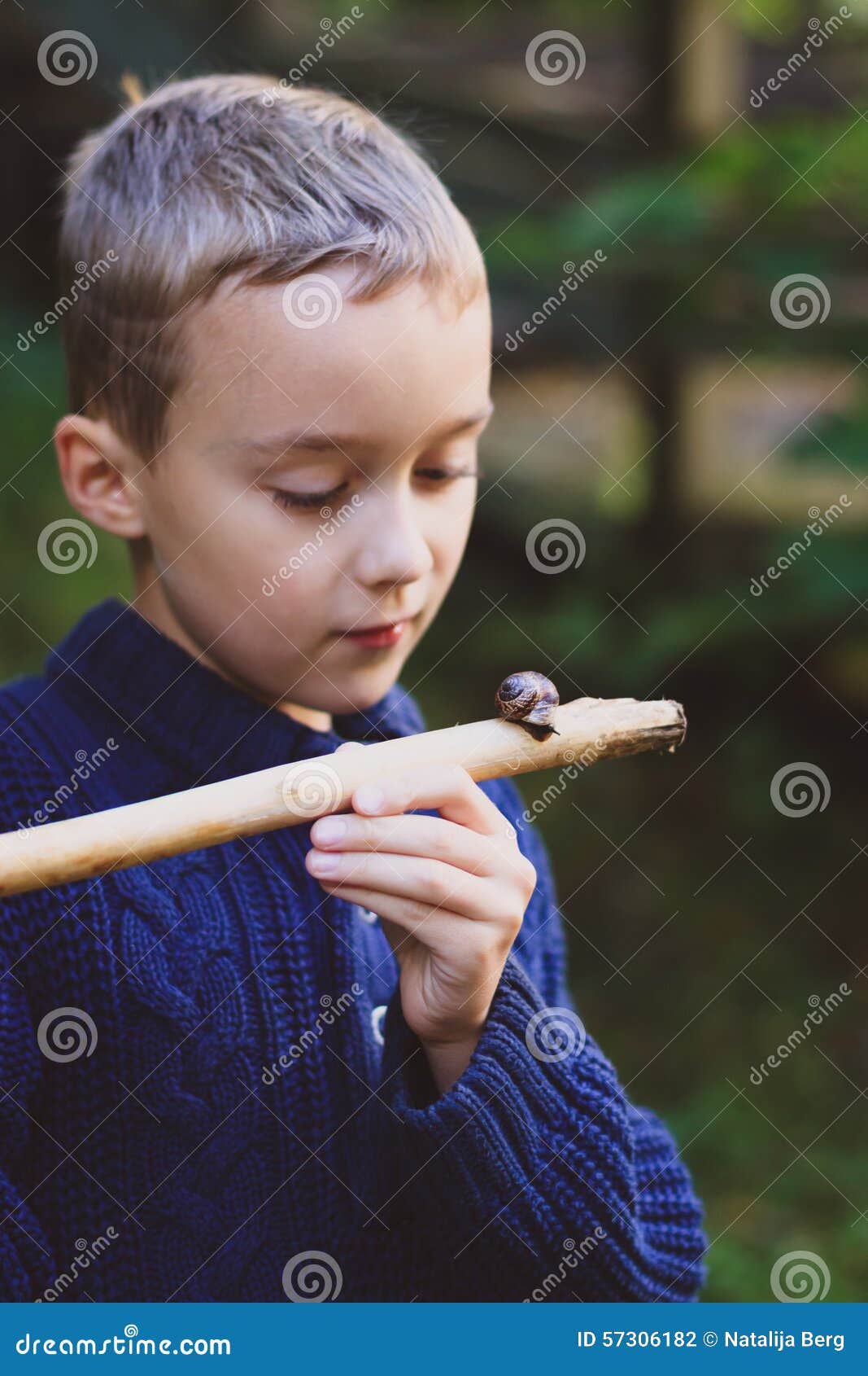 Boy and snail stock photo. Image of snail, people, happy - 57306182
