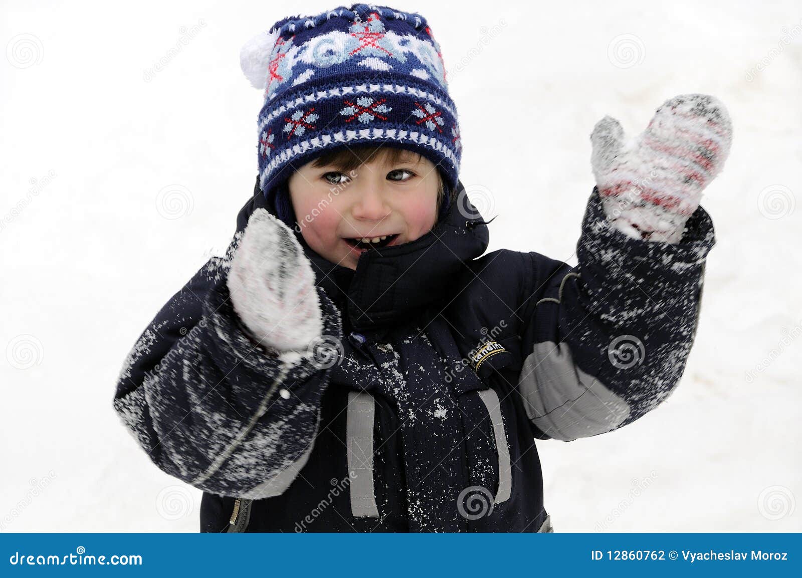 Boy in the snow stock photo. Image of eyes, winter, snow - 12860762