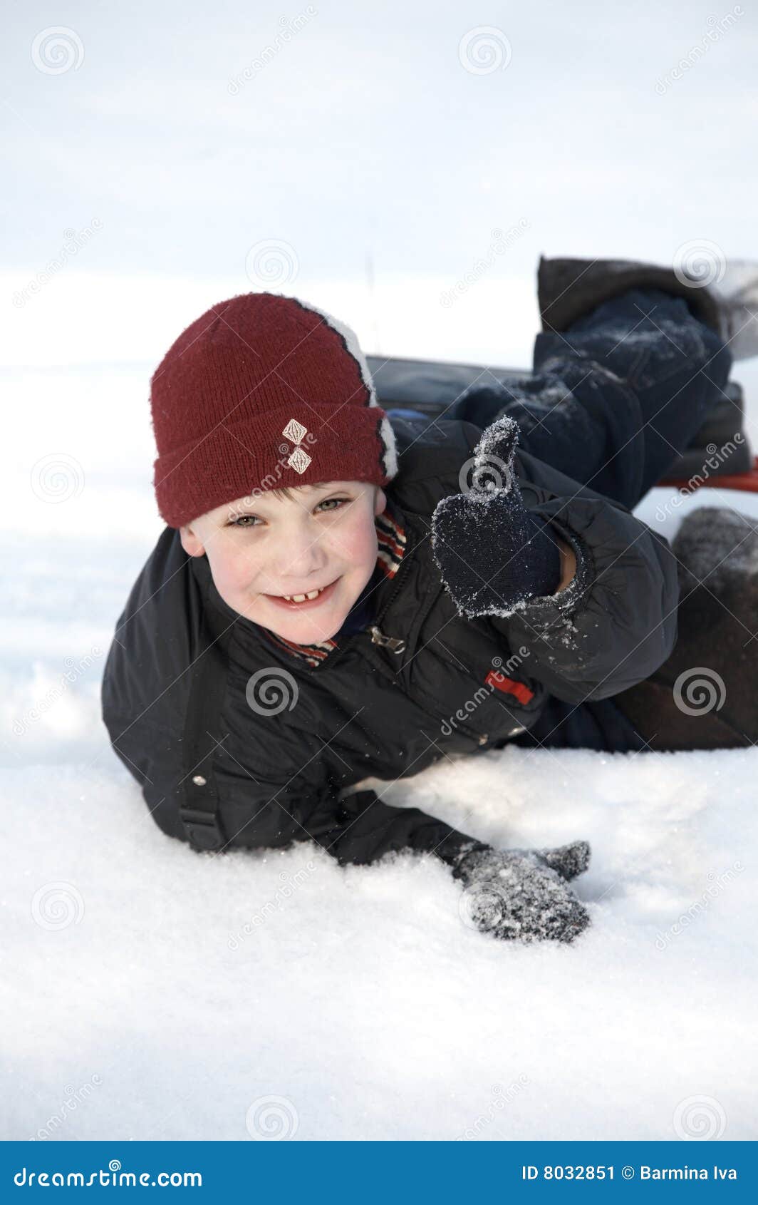 A boy in snow stock image. Image of downfall, fall, white - 8032851