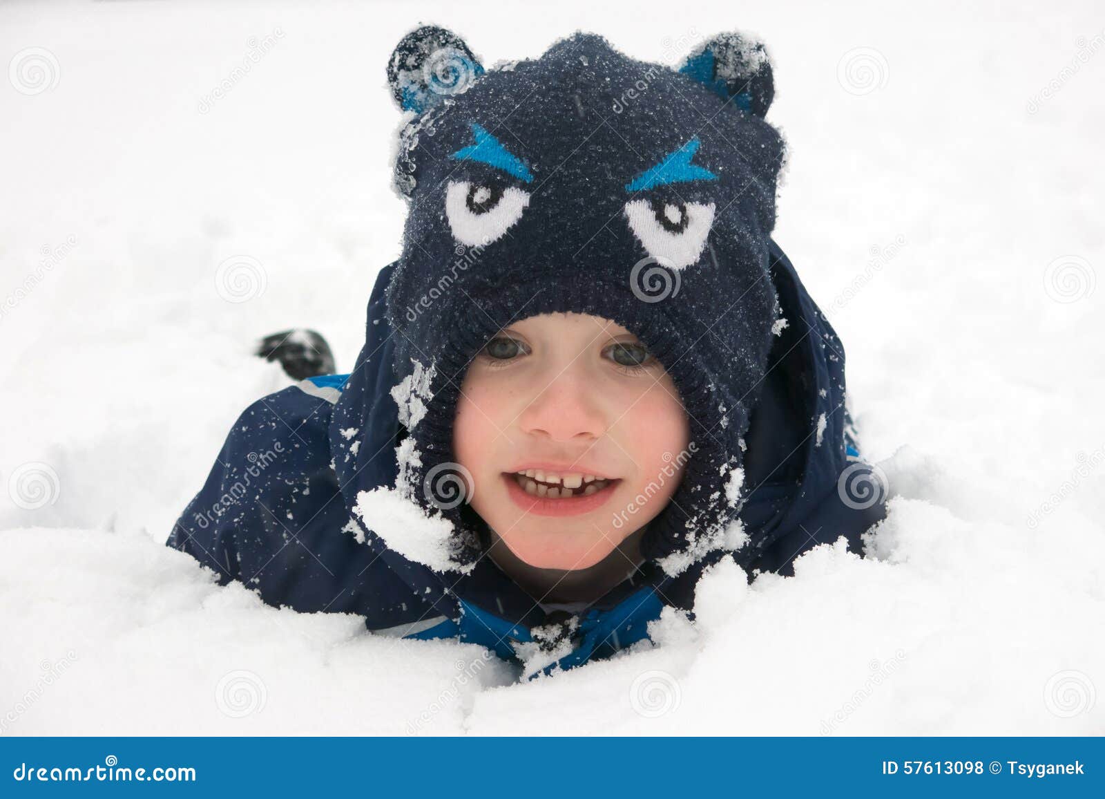 A boy in the snow stock photo. Image of face, wonder - 57613098
