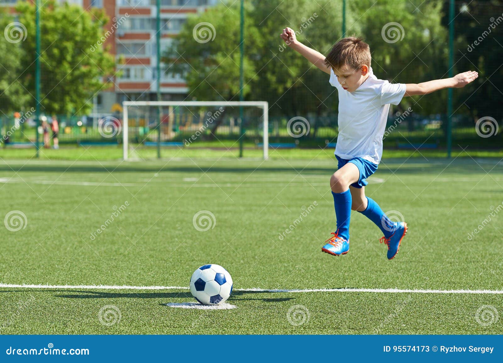 Boy Soccer Player with Jump before Kick on Ball Stock Image - Image of ...