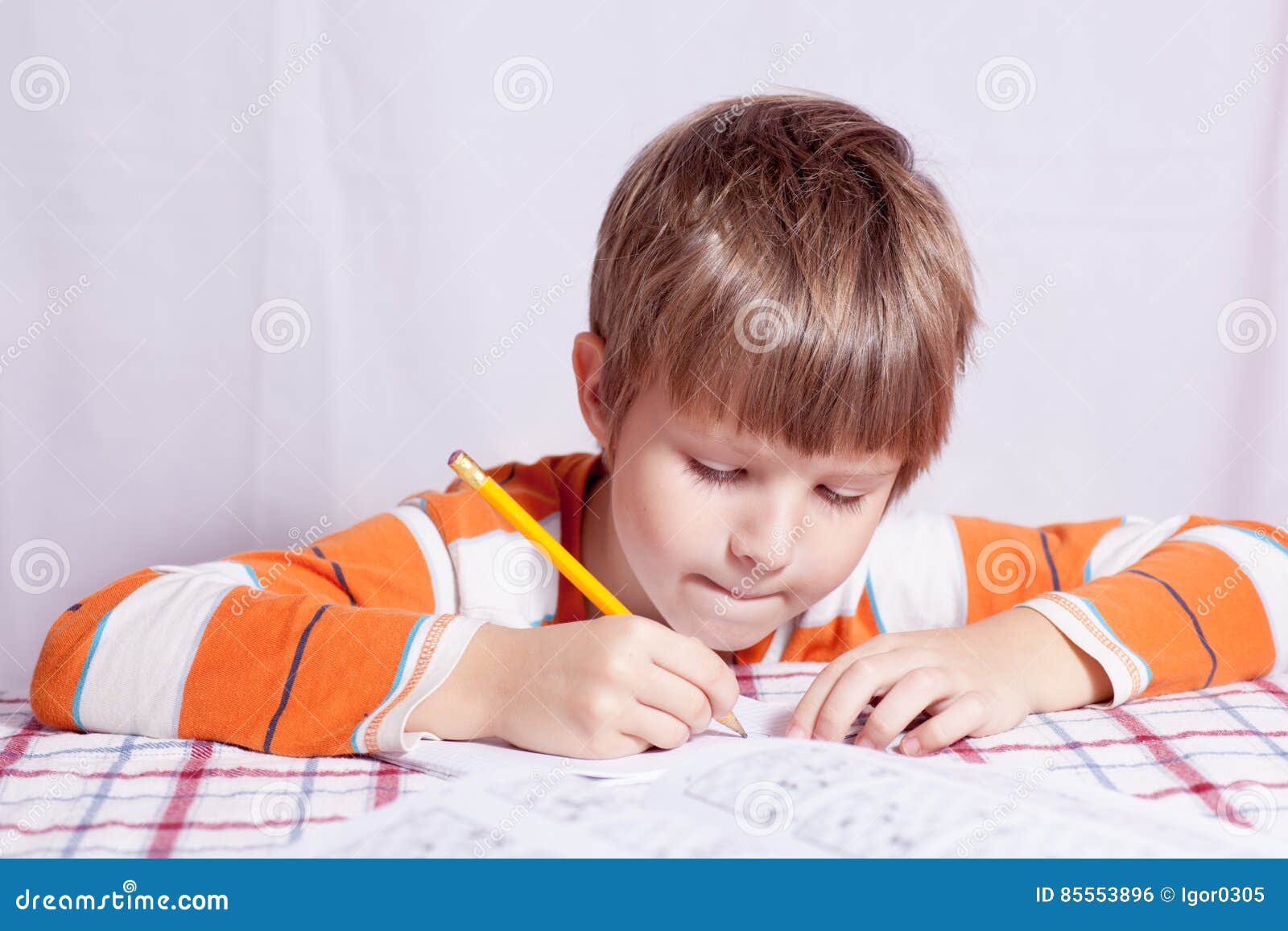 Boy solving exercises stock photo. Image of classmates - 85553896