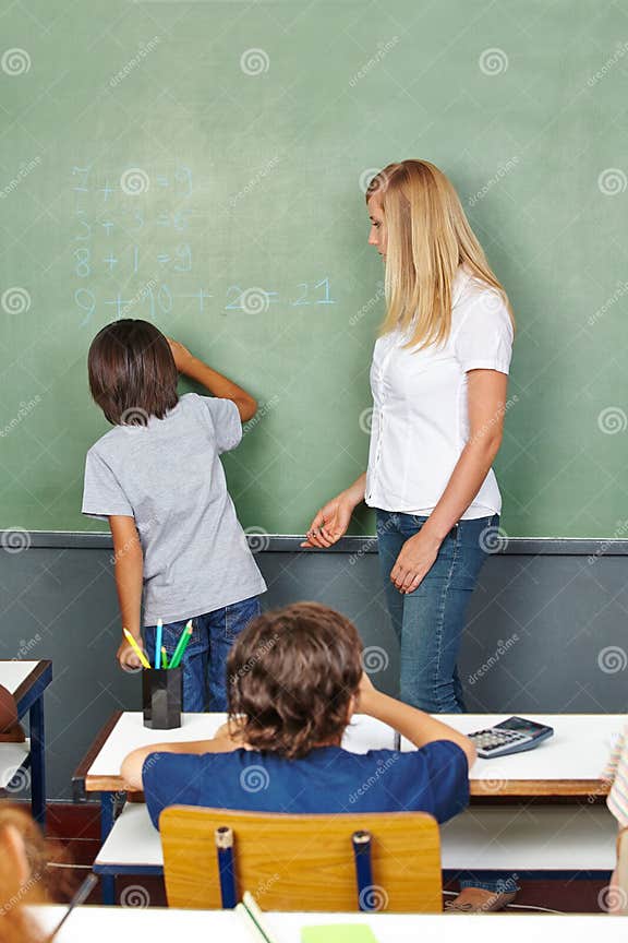 Boy Solving Math Problem in Class Stock Image - Image of maths, child ...