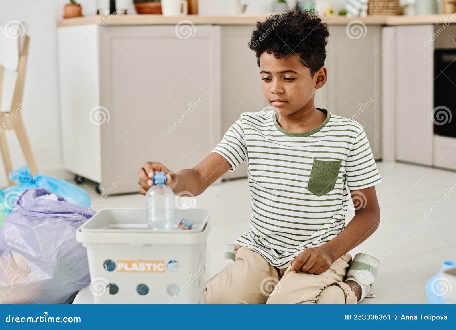 Boy Sorting Plastic Bottles in Containers Stock Image - Image of ...