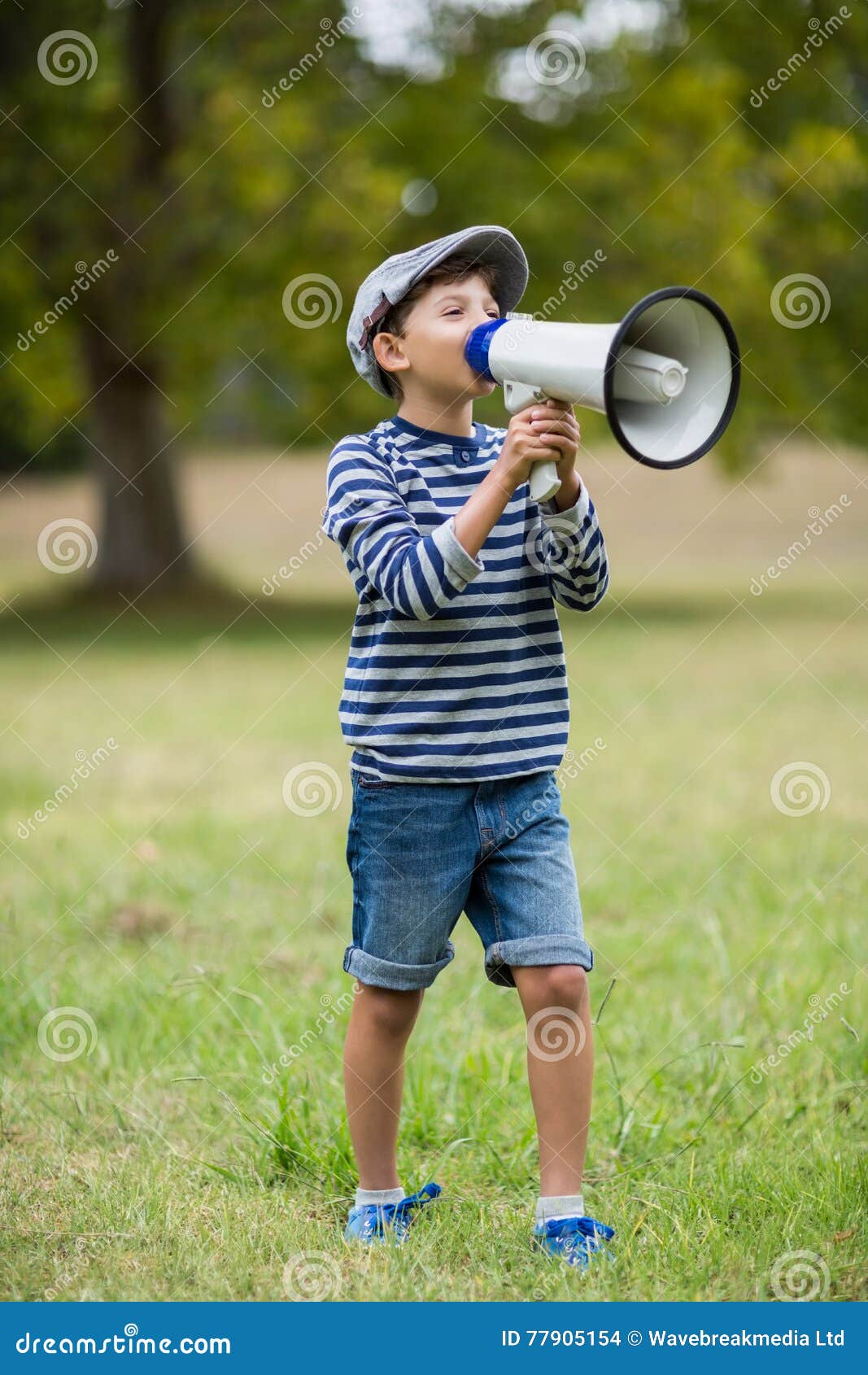 Boy speaking on megaphone stock photo. Image of megaphone - 77905154