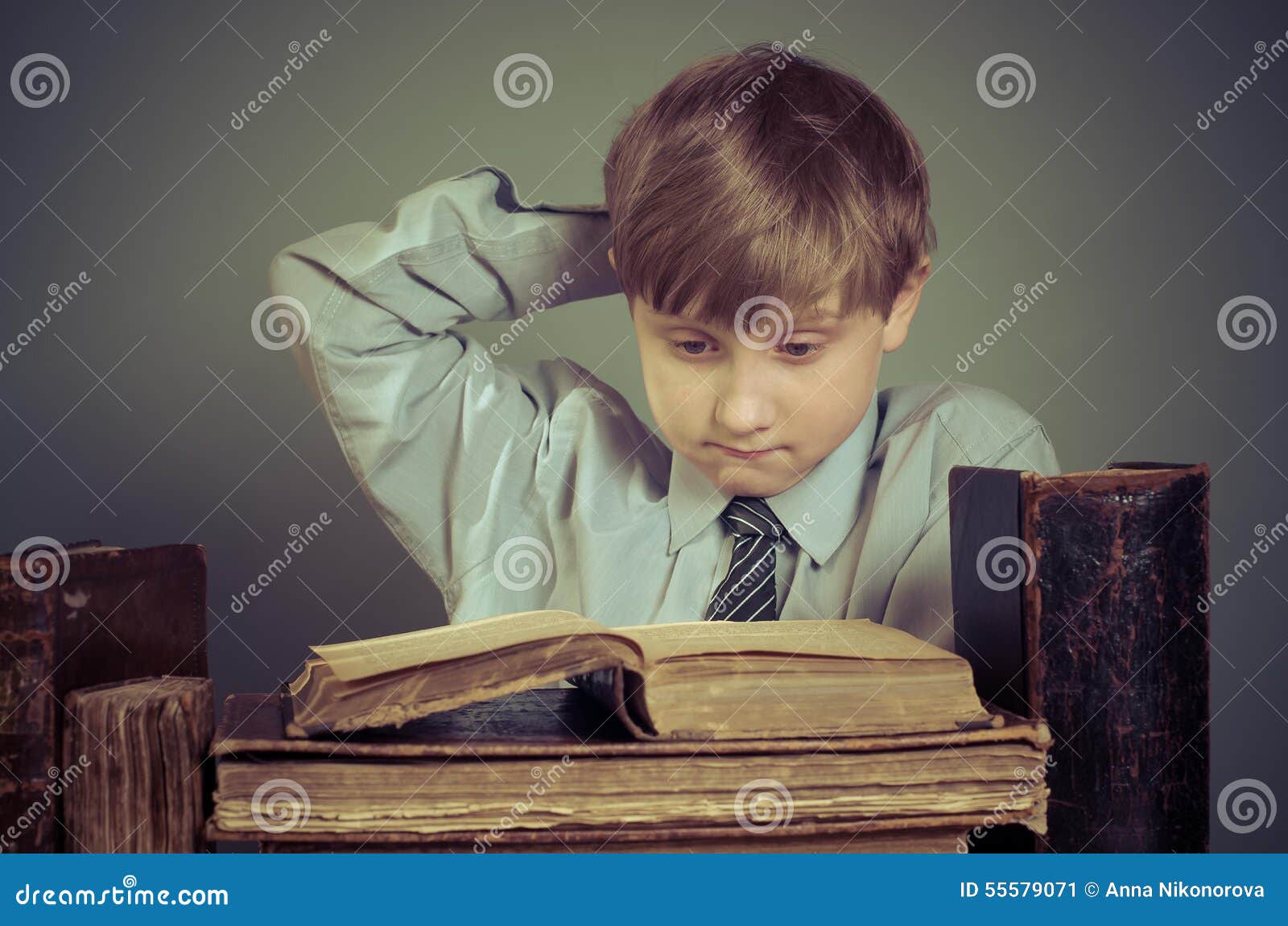 The Boy Spends Time Reading Old Books Stock Image - Image of education ...