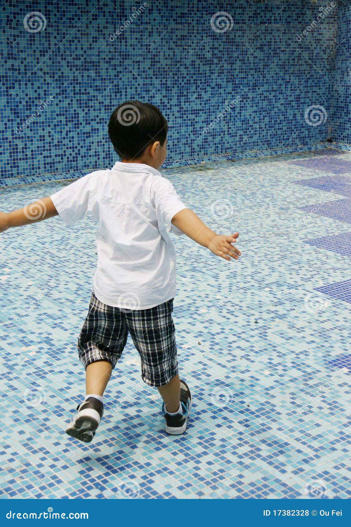 Boy spinning for fun stock photo. Image of people, sunny - 17382328