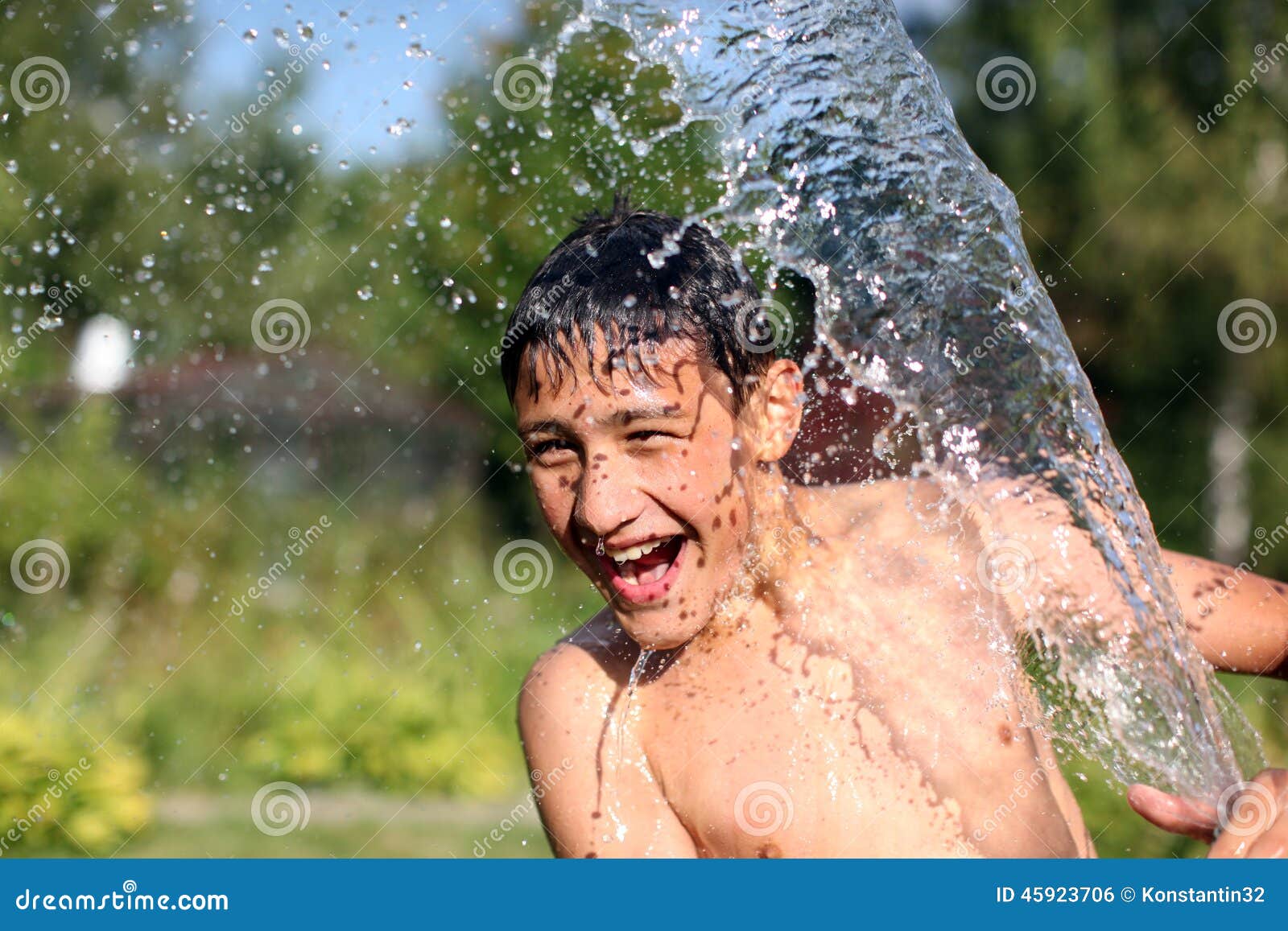 Boy with Splash Water in Hot Summer Day Stock Photo - Image of ...