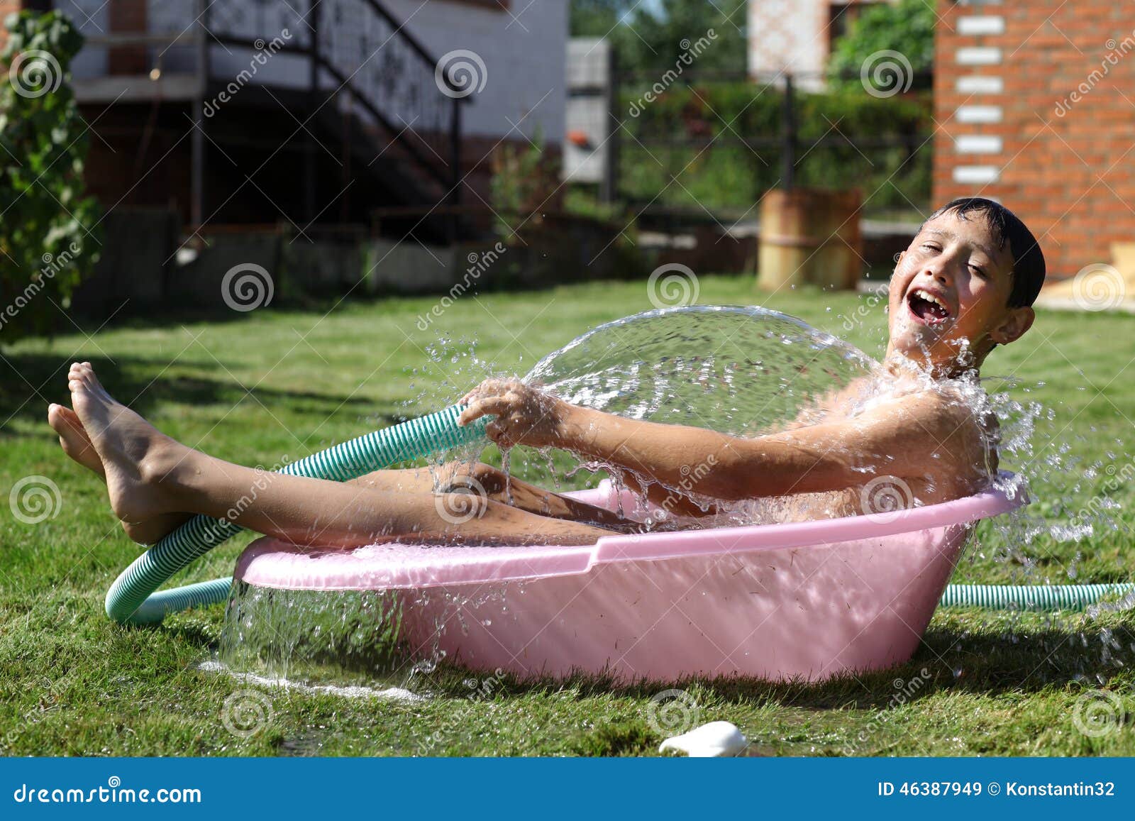 Boy with Splash Water in Hot Summer Day Stock Image - Image of copy ...
