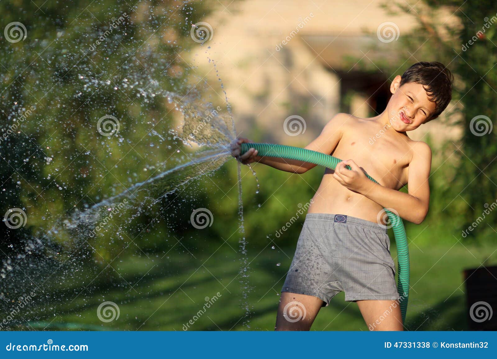 Boy with Splash Water in Hot Summer Day Stock Photo - Image of playful ...