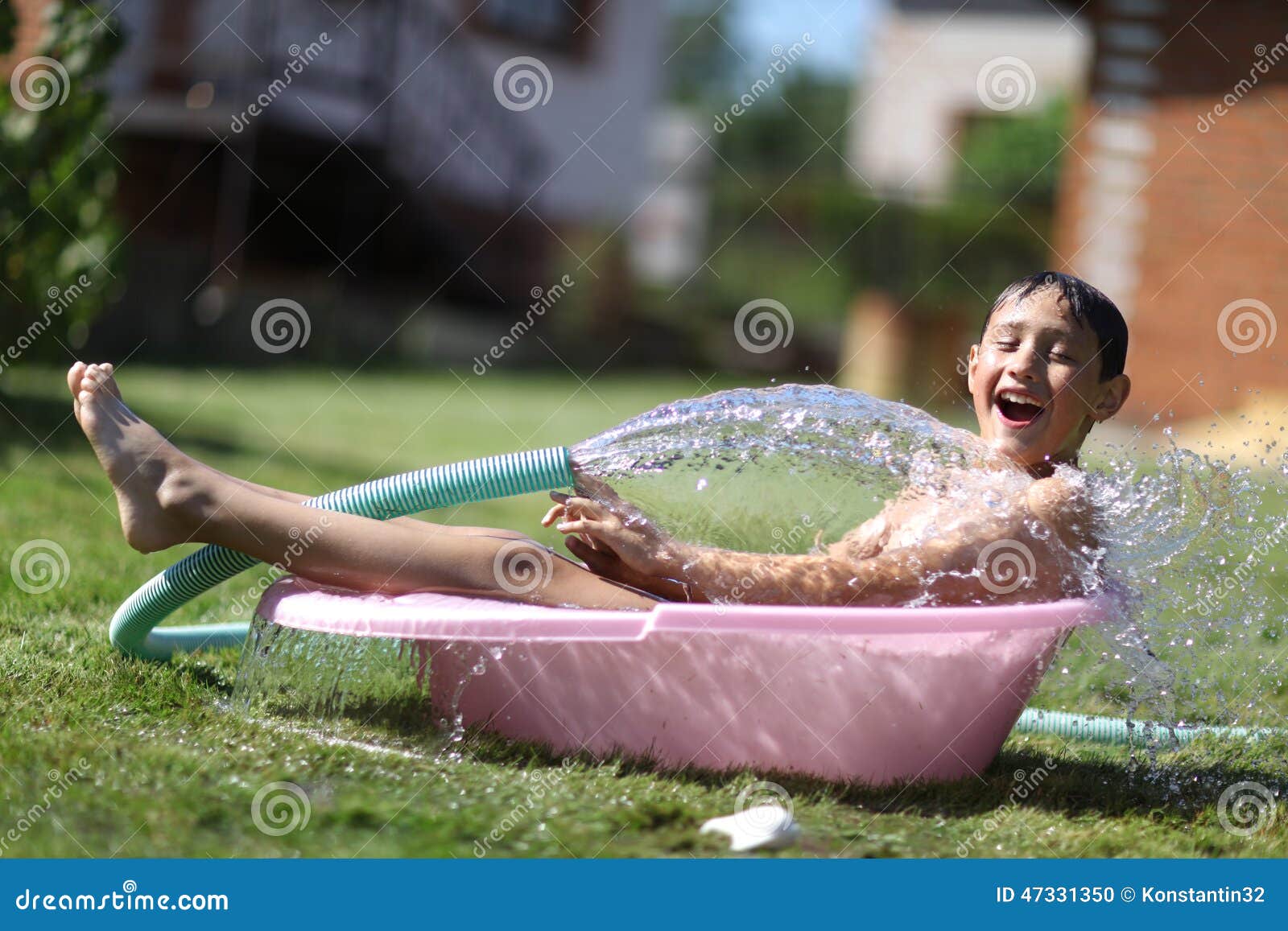 Boy with Splash Water in Hot Summer Day Stock Photo - Image of happy ...