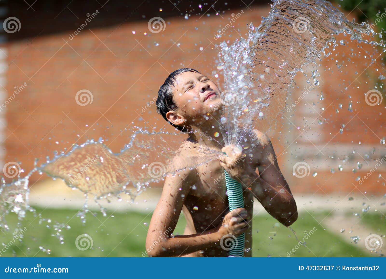 Boy with Splash Water in Hot Summer Day Stock Image - Image of joyful ...