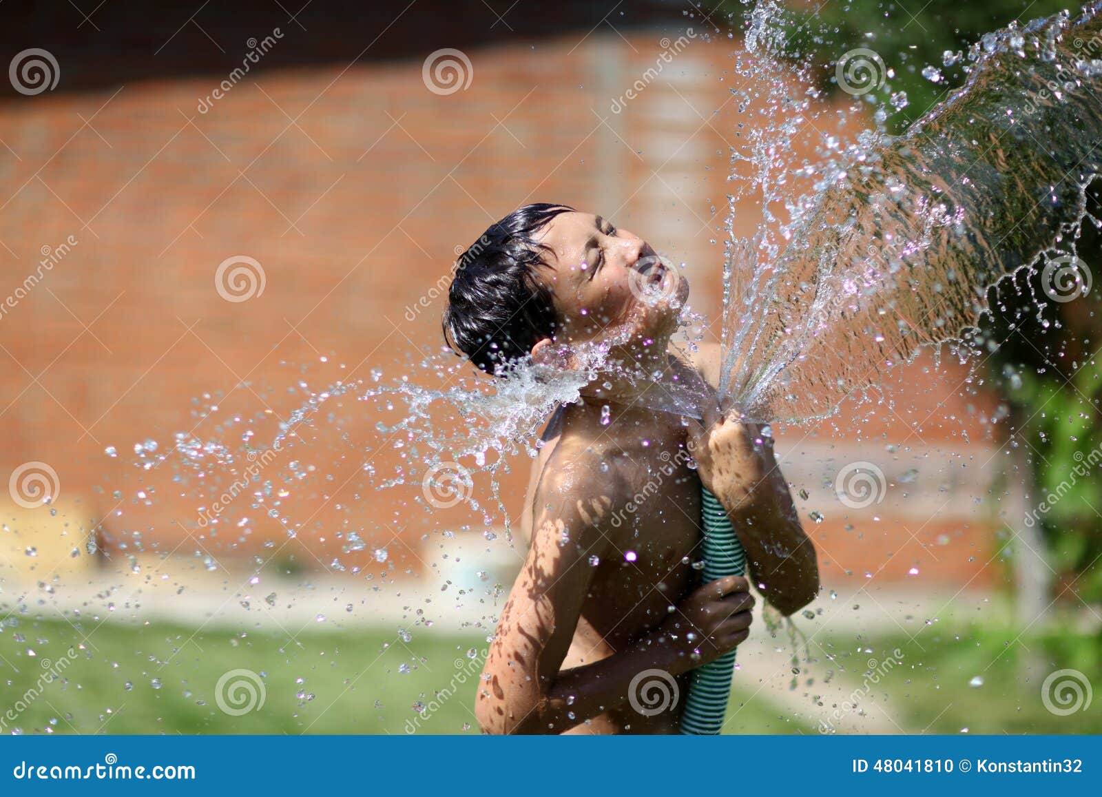 Boy with Splash Water in Hot Summer Day Stock Photo - Image of cute ...