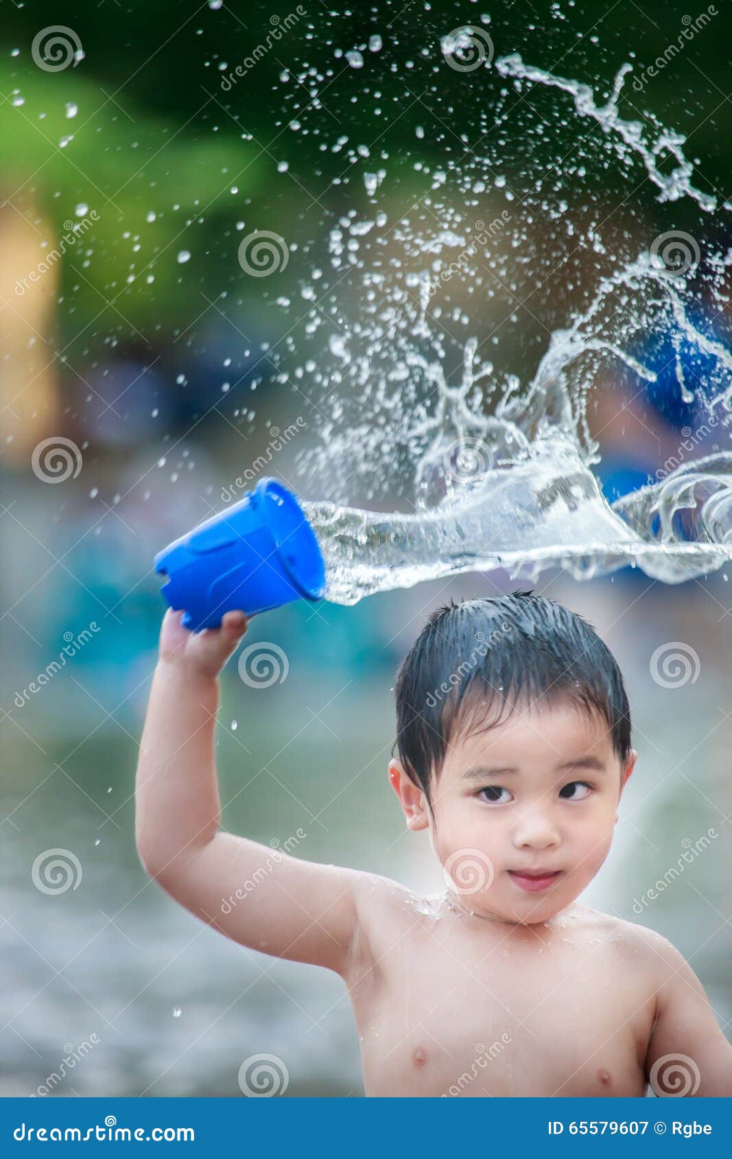 Boy splash water stock image. Image of head, splash, splashing - 65579607