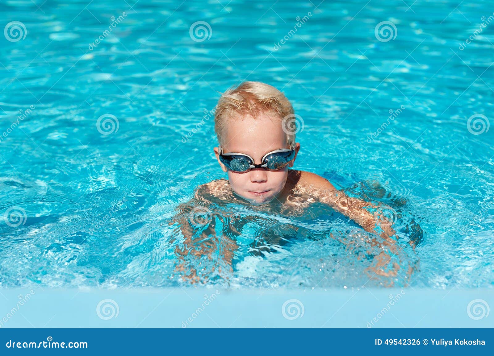 Boy splashing in the water stock photo. Image of water - 49542326