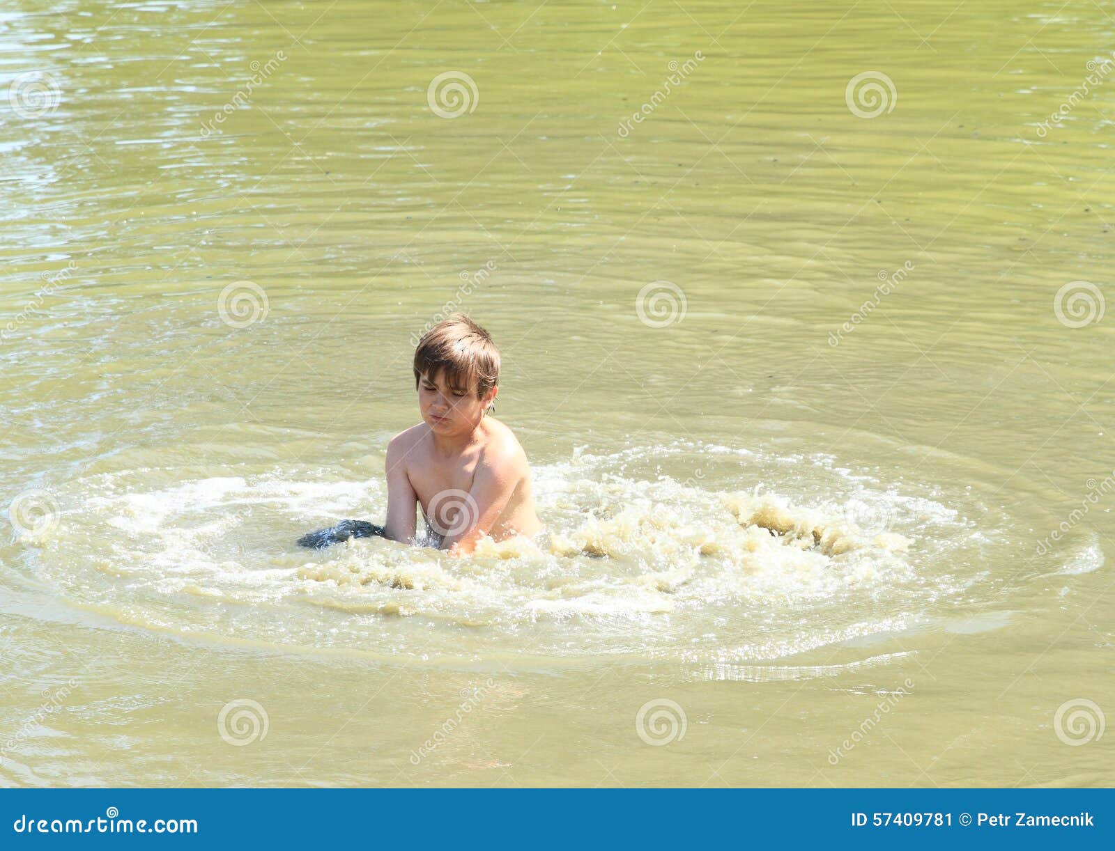 Boy splashing water stock image. Image of standing, little - 57409781