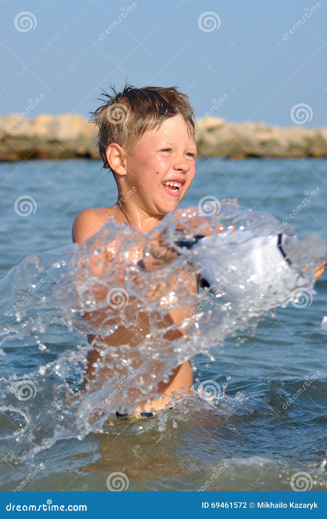 Boy SPLASHING water stock photo. Image of real, activity - 69461572