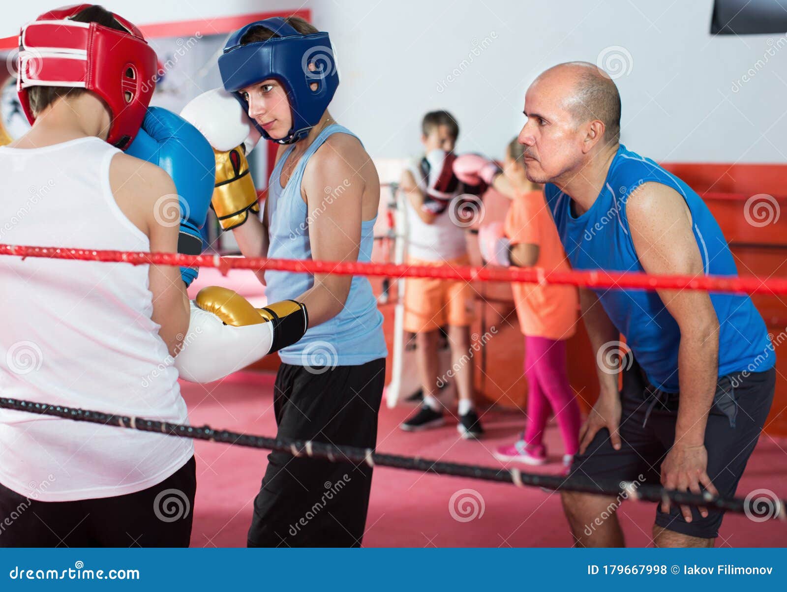 Boy Sportsman at Boxing Workout with Instructor Stock Photo - Image of ...