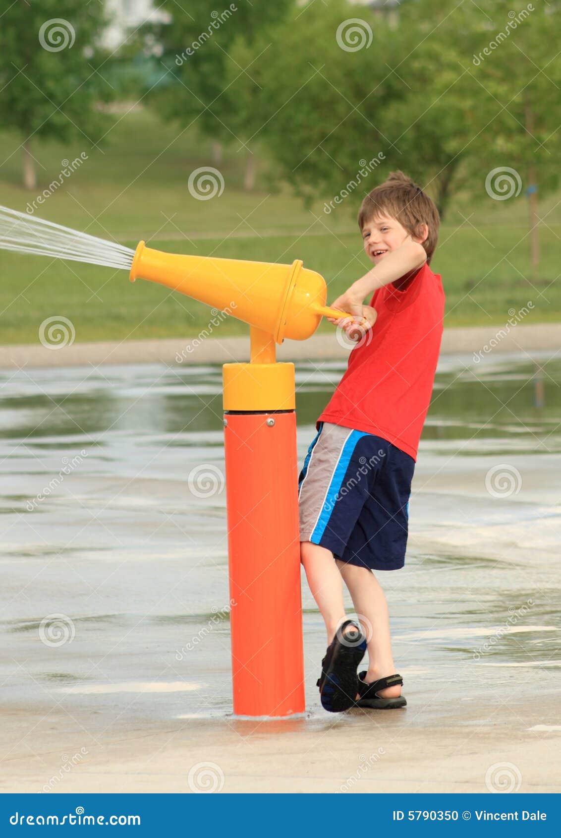 Boy Spraying stock photo. Image of childhood, happy, cute - 5790350