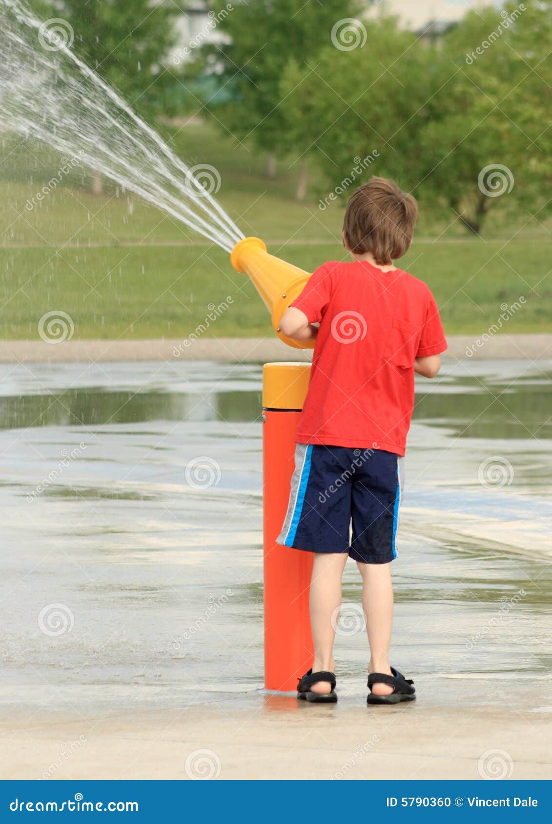 Boy Spraying stock photo. Image of laughing, looking, playful - 5790360