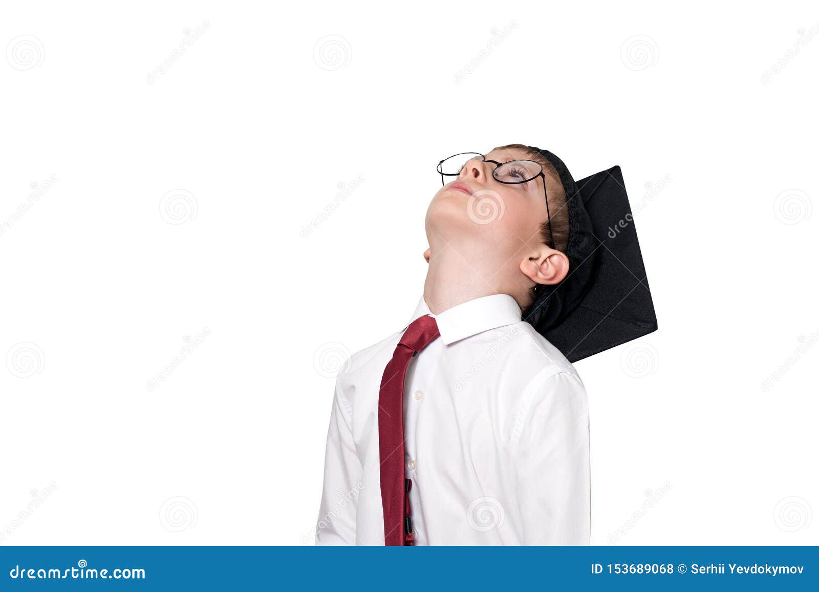 Boy in a Square Academic Hat and Glasses Lookong Up. School Concept ...