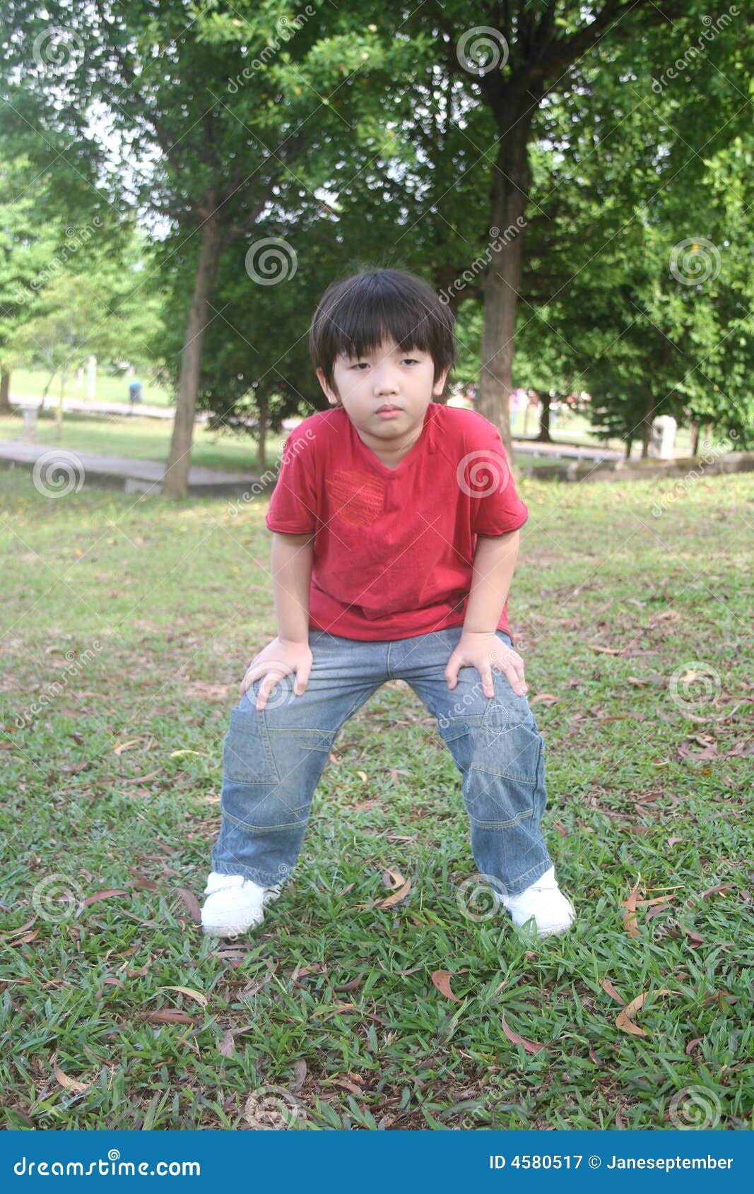 Boy Squatting Picture. Image: 4580517