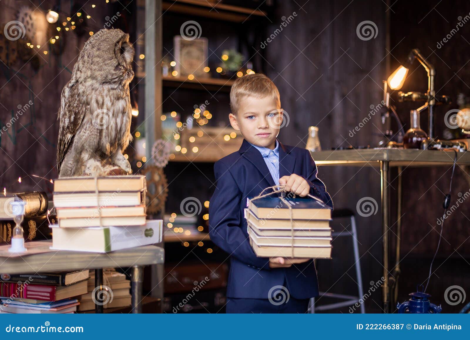 Boy with a Stack of Books Comes from the Library. Smart Schoolboy ...