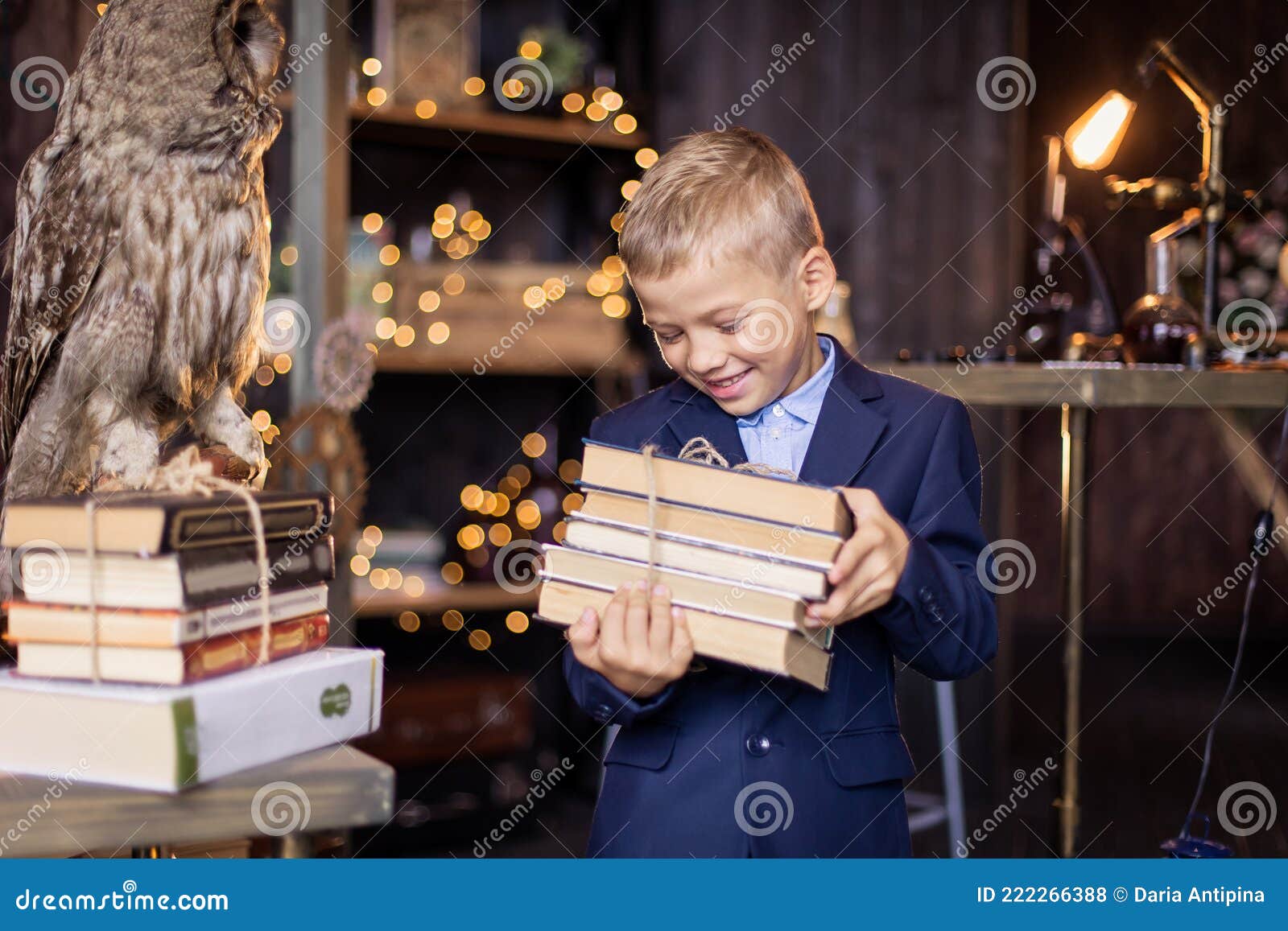 Boy with a Stack of Books Comes from the Library. Smart Schoolboy ...